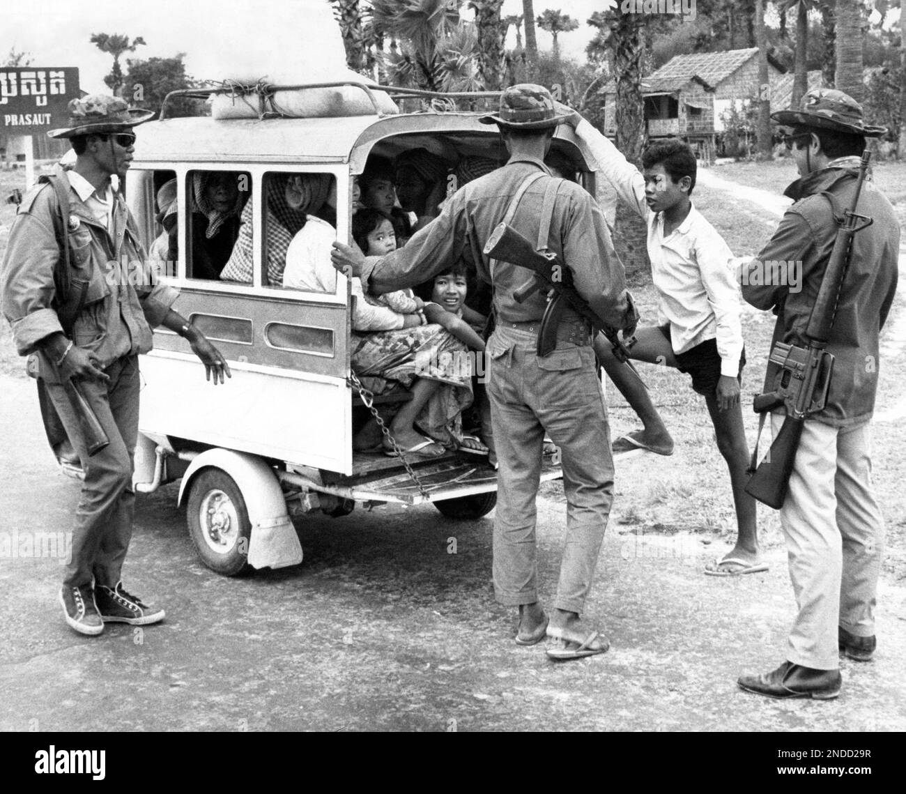 Cambodian soldiers, wearing cast-off U.S. military fatigues and armed ...