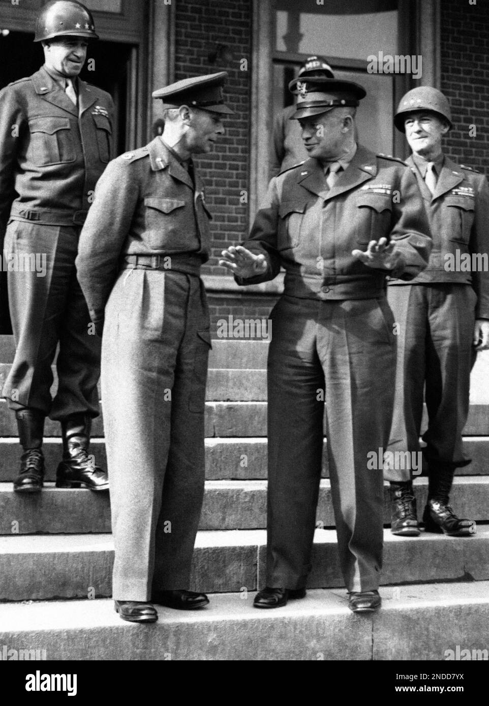 American General Dwight Eisenhower, right, relating an amusing incident ...