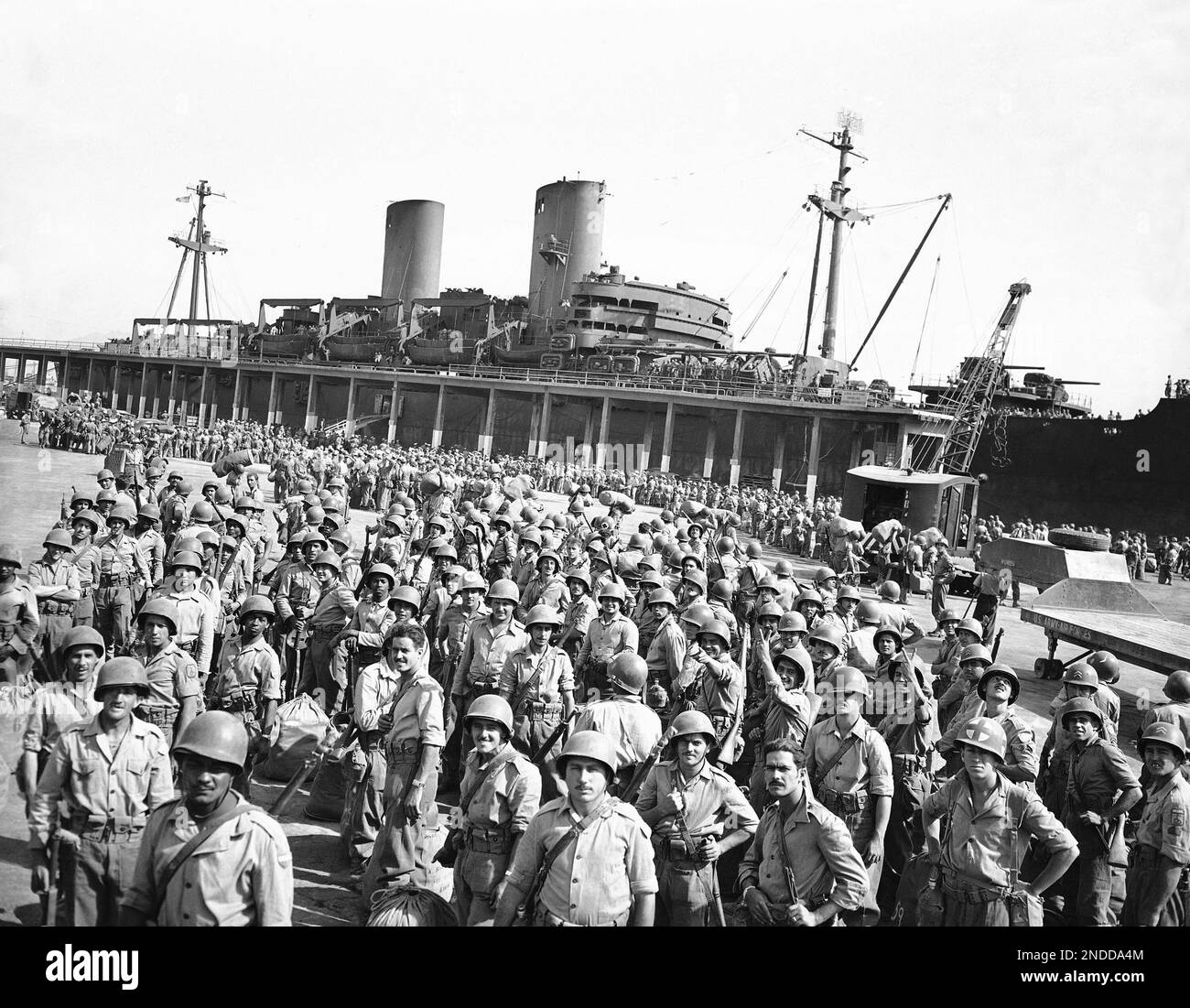 Soldiers of the Brazilian Expeditionary Force line up on the pier at ...