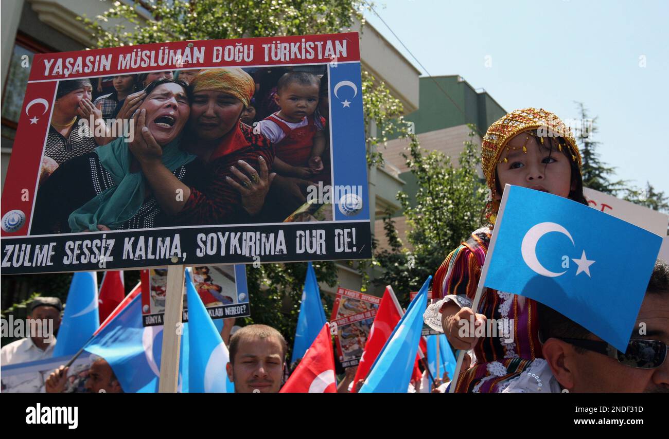 Uighurs living in Turkey stage a demonstration outside the Chinese ...