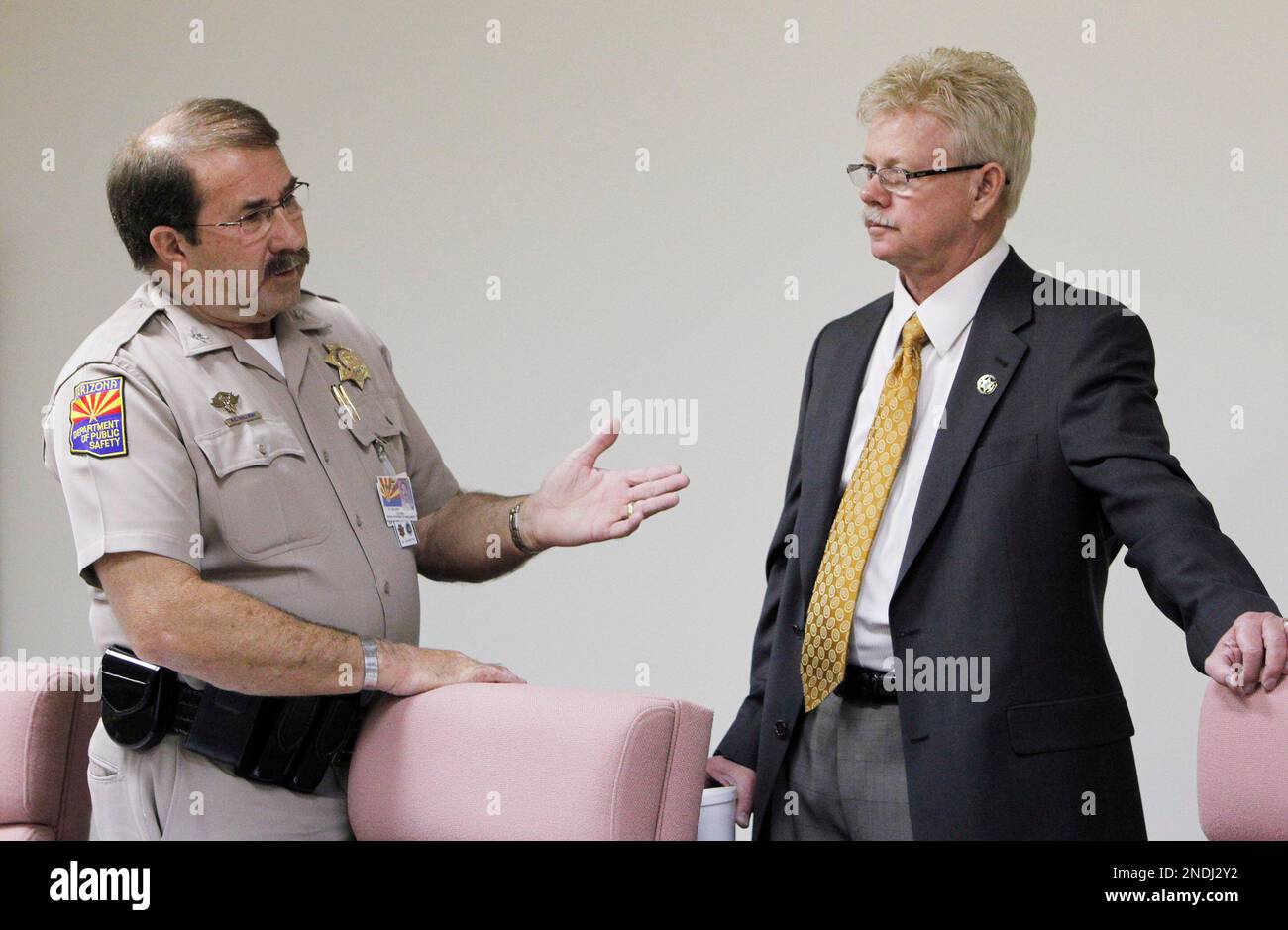 Arizona Department of Public Safety Director Robert Halliday, left, and ...