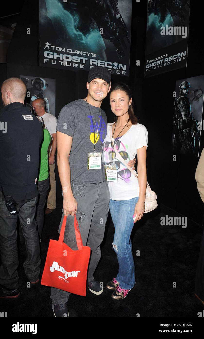 Rick Malambri, left, and Lisa Piepergerdes at the Ubisoft Booth at the ...