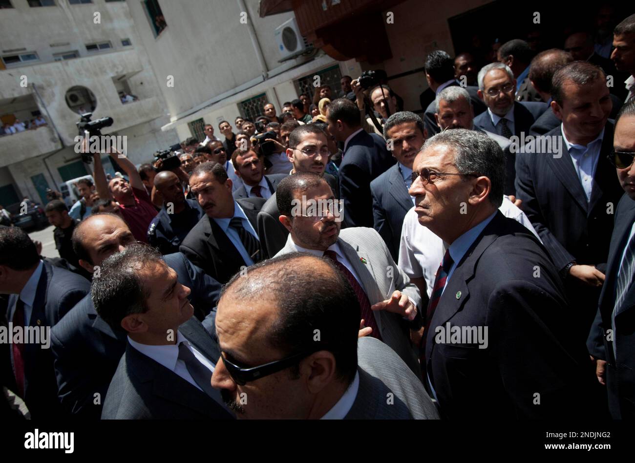 Arab League Secretary General Amr Moussa of Egypt, right, arrives for a ...