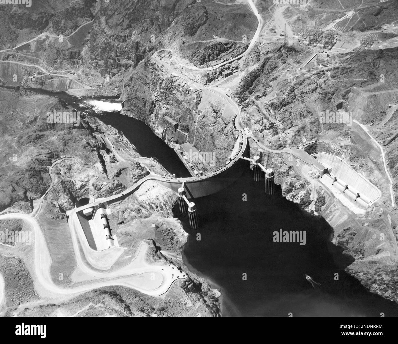 An aerial view of Boulder Dam on the Colorado River looking downstream ...
