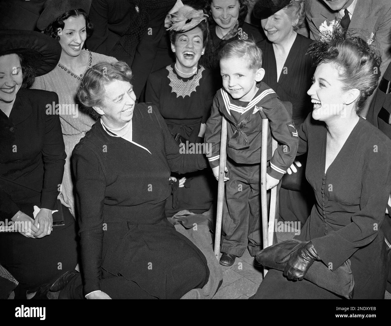 Gerry King, 4, smiling pleasantly despite the infantile paralysis which ...