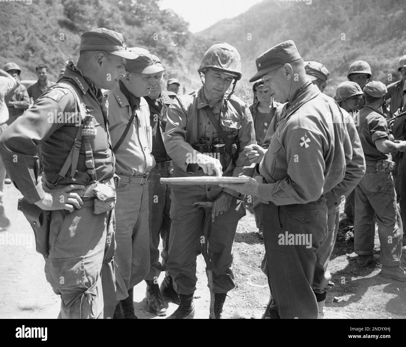 Top field commanders hold a roadside conference during a front line ...