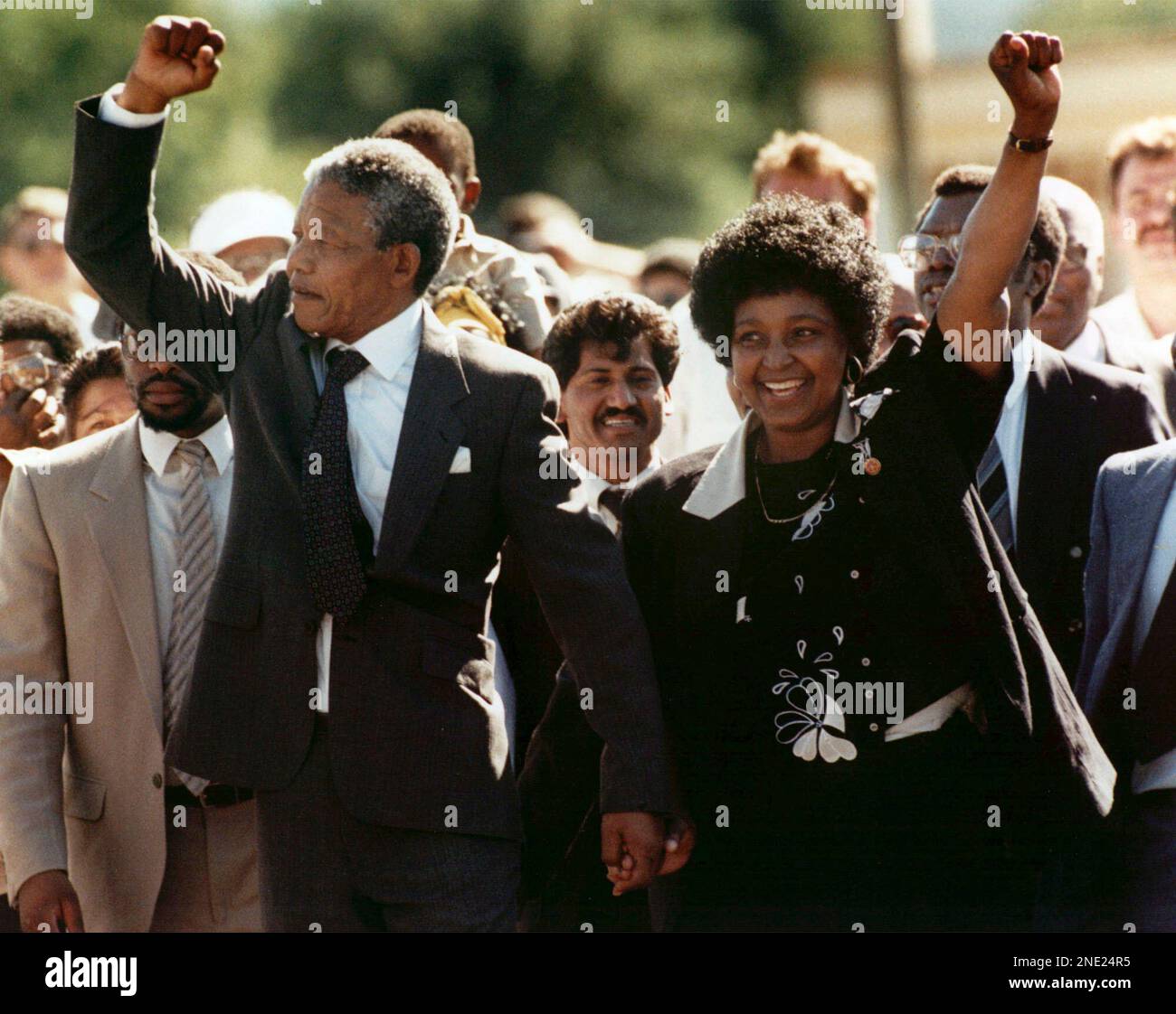 FILE - In this Feb. 11, 1990 file photo Nelson Mandela and wife Winnie, walking hand in hand ...