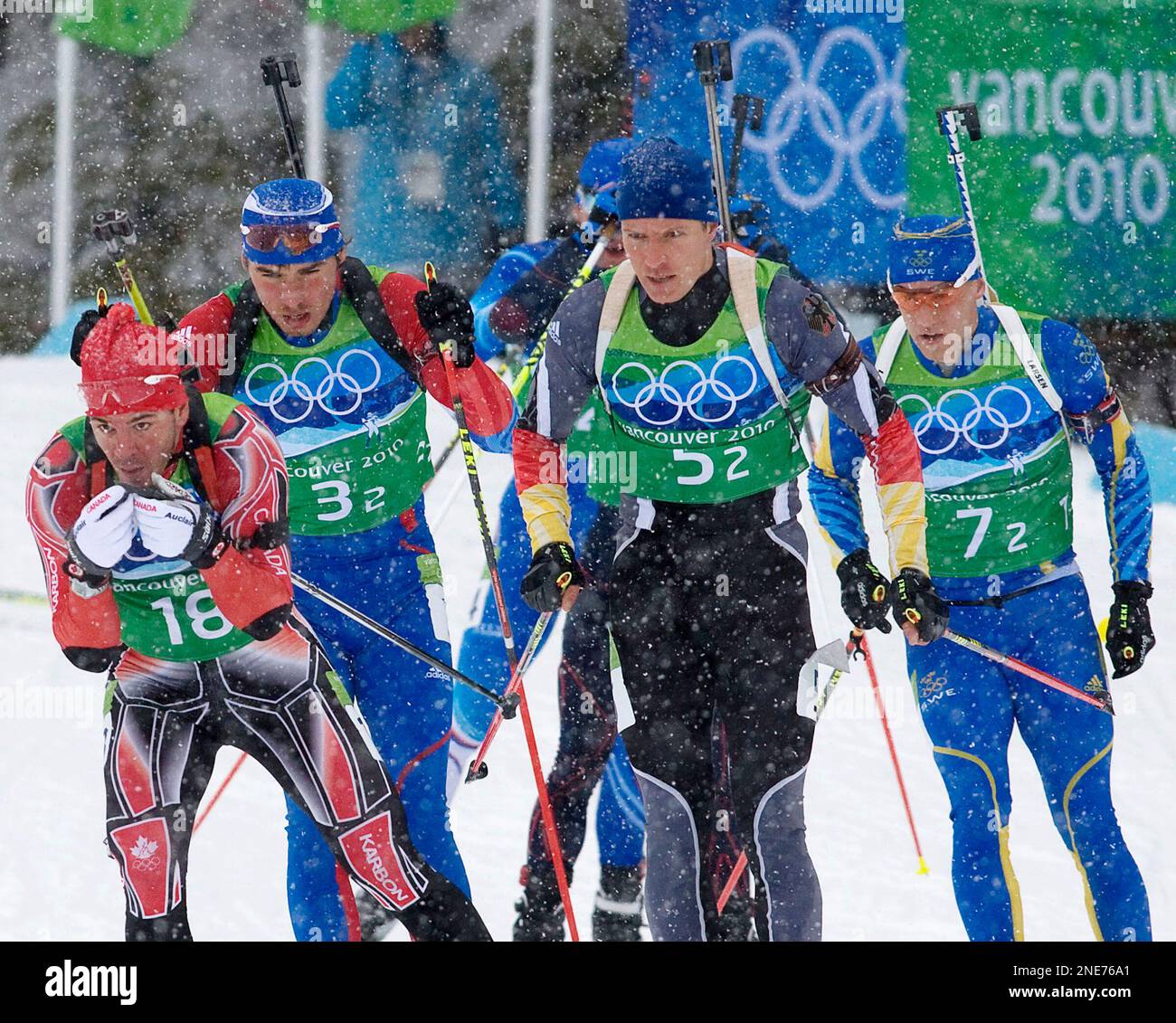Canada's Marc-Andre Bedard, Russia's Anton Shipulin, Germany's Andreas ...