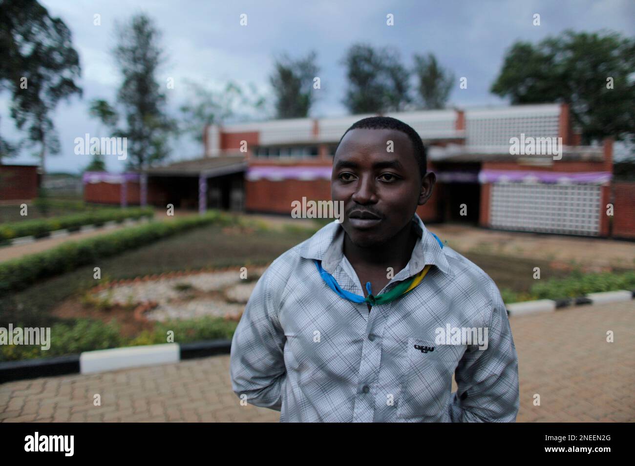 In this Sept. 27, 2009 photo, Charles Mugabe, 23, poses for a picture ...