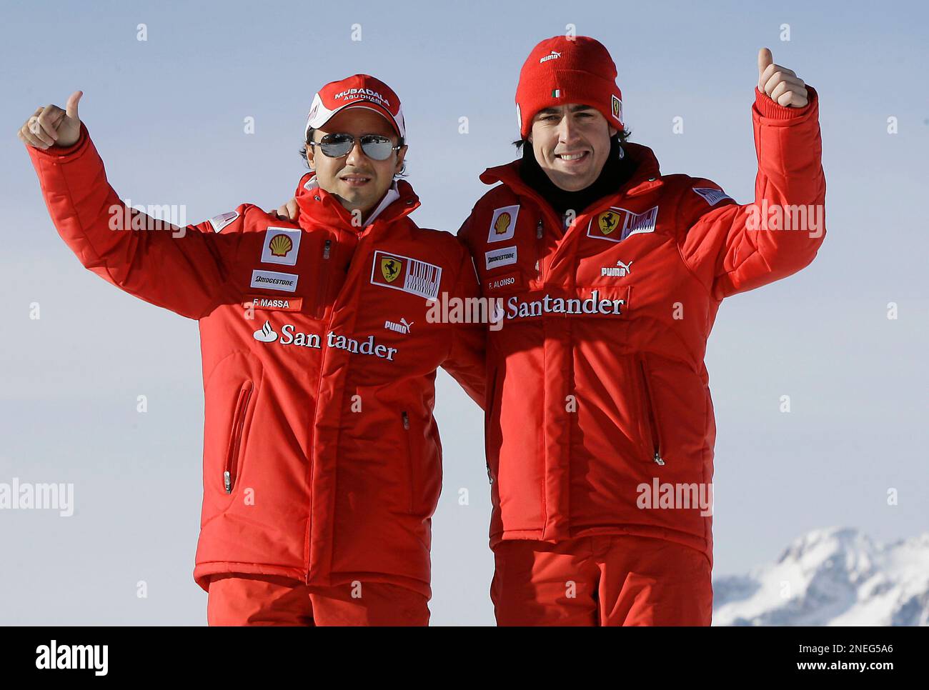 Formula One Ferrari drivers Felipe Massa, left, of Brazil, and Fernando Alonso, of Spain, pose ...