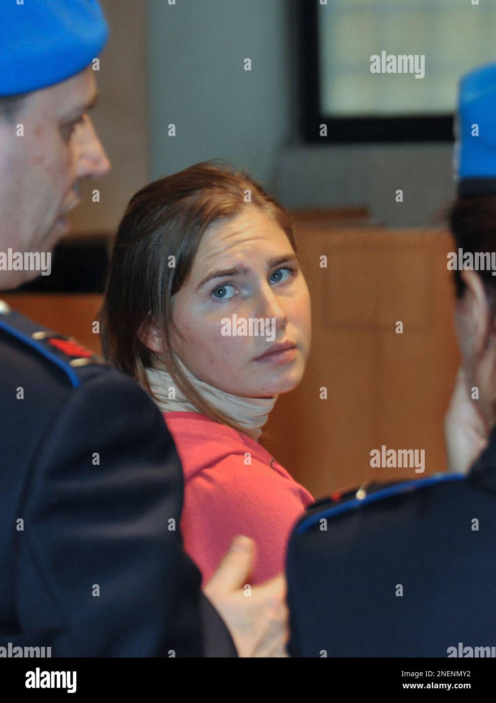 U.S. murder suspect Amanda Knox reacts during a break of the hearing at ...