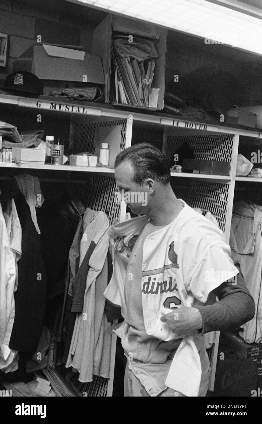 Uniform bearing No. 6, Stan Musial's comes off as Stan Musial completes ...