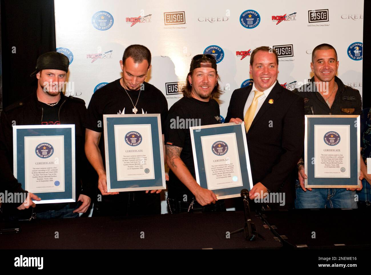 L-R Creed bassist Brian Marshall, guitarist Mark Tremonti, drummer ...