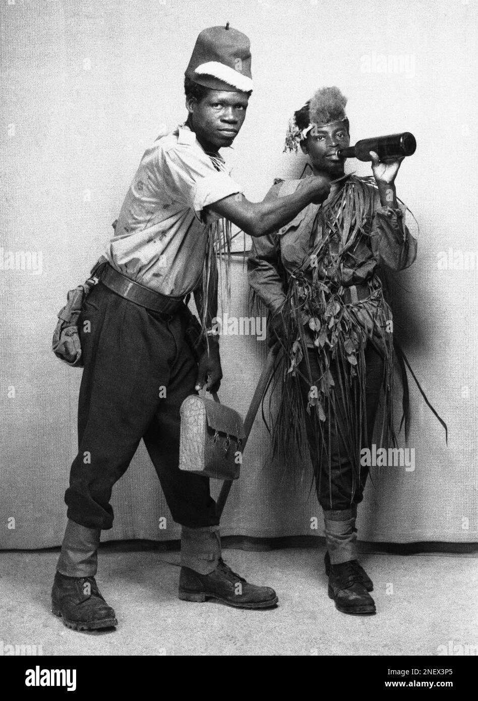 Two Congolese Rebels of the band known as the Simbas (young lions) pose ...