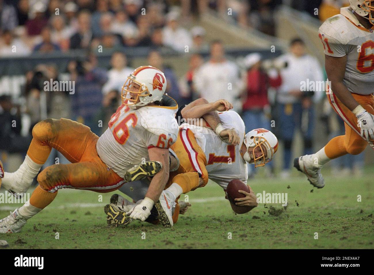 Tampa Bay Buccaneers quarterback Craig Erickson reacts as he heads for ...