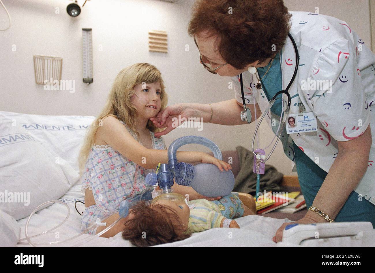 As Chelsey Thomas gives her doll Sarah therapy with an inhalation ...