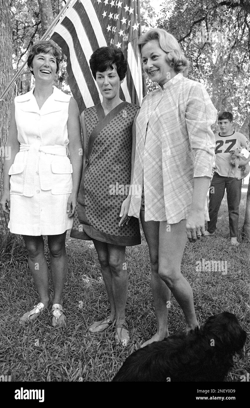 Wearing robes to cover their swimsuits the wives of Apollo 11 spacemen pose during a picture ...