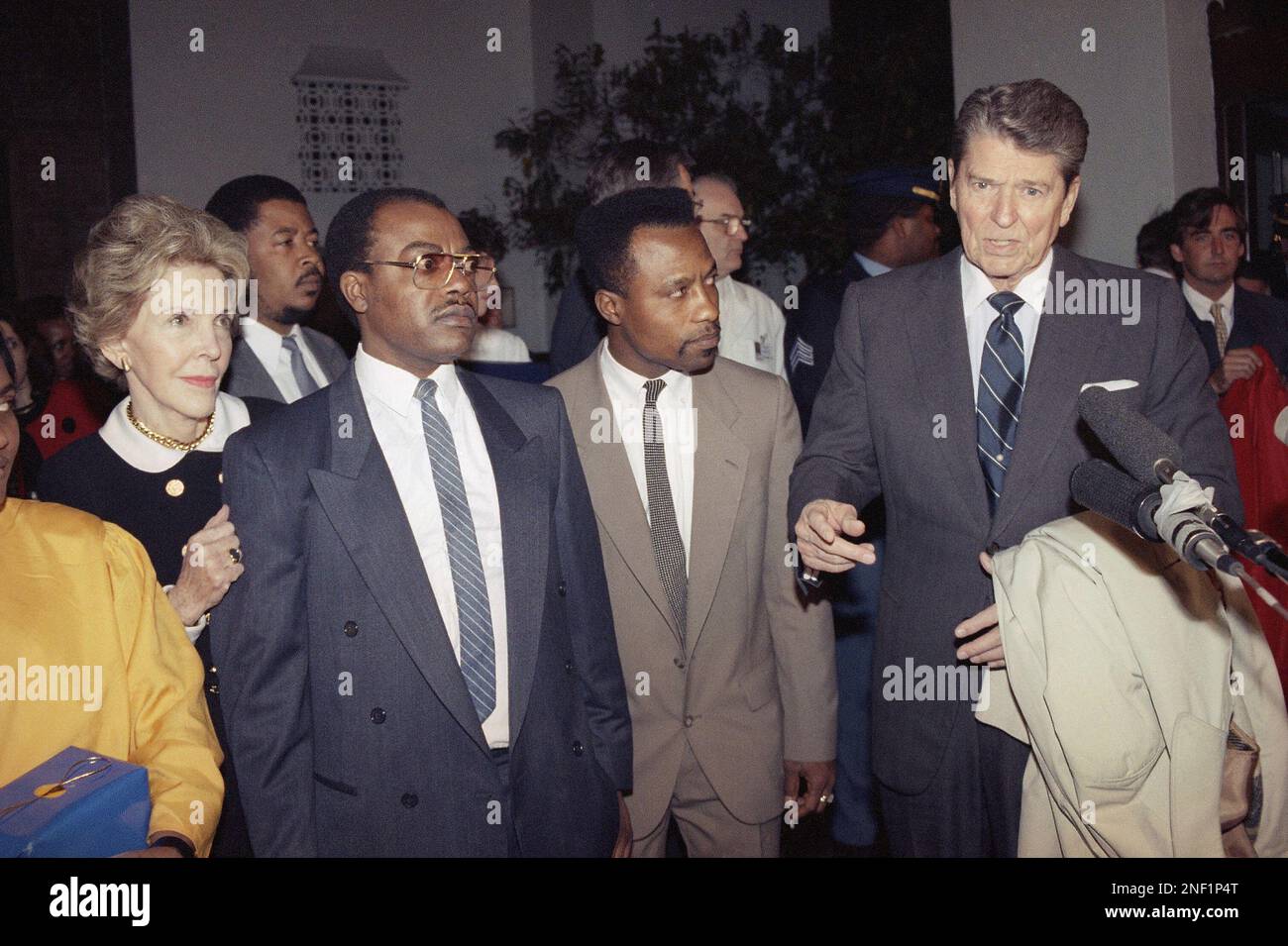 Nancy Reagan, left, and former President Ronald Reagan, right, meet ...