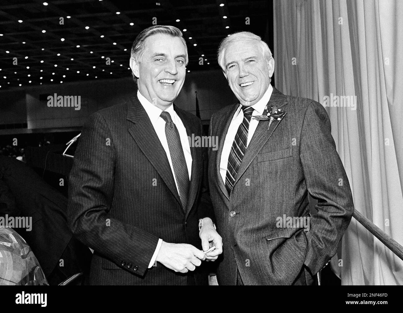 Former Vice President Walter F. Mondale (left) chats with United Auto Workers union President ...