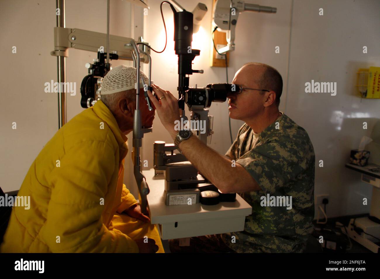 An inmate gets his eyes check at US military detention facility Camp ...