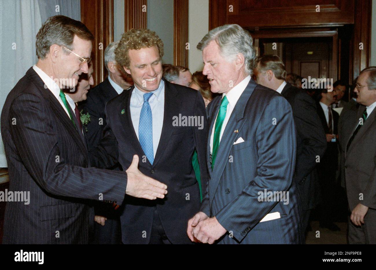 President George Bush shakes hands with Sen. Edward Kennedy (D-Mass ...