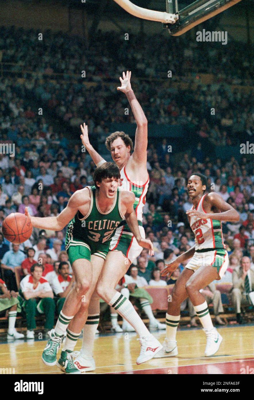 Boston's Kevin McHale (32) runs into Milwaukee's Paul Mokeski as he ...