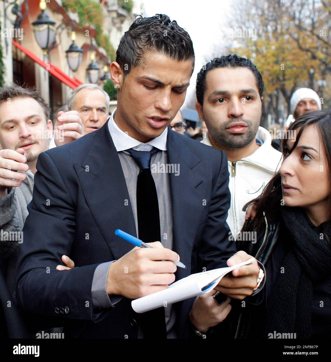 Portuguese international soccer player Cristiano Ronaldo signs ...
