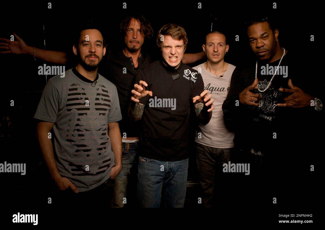 Musicians left to right: Linkin Park co-lead vocalist Mike Shinoda ...