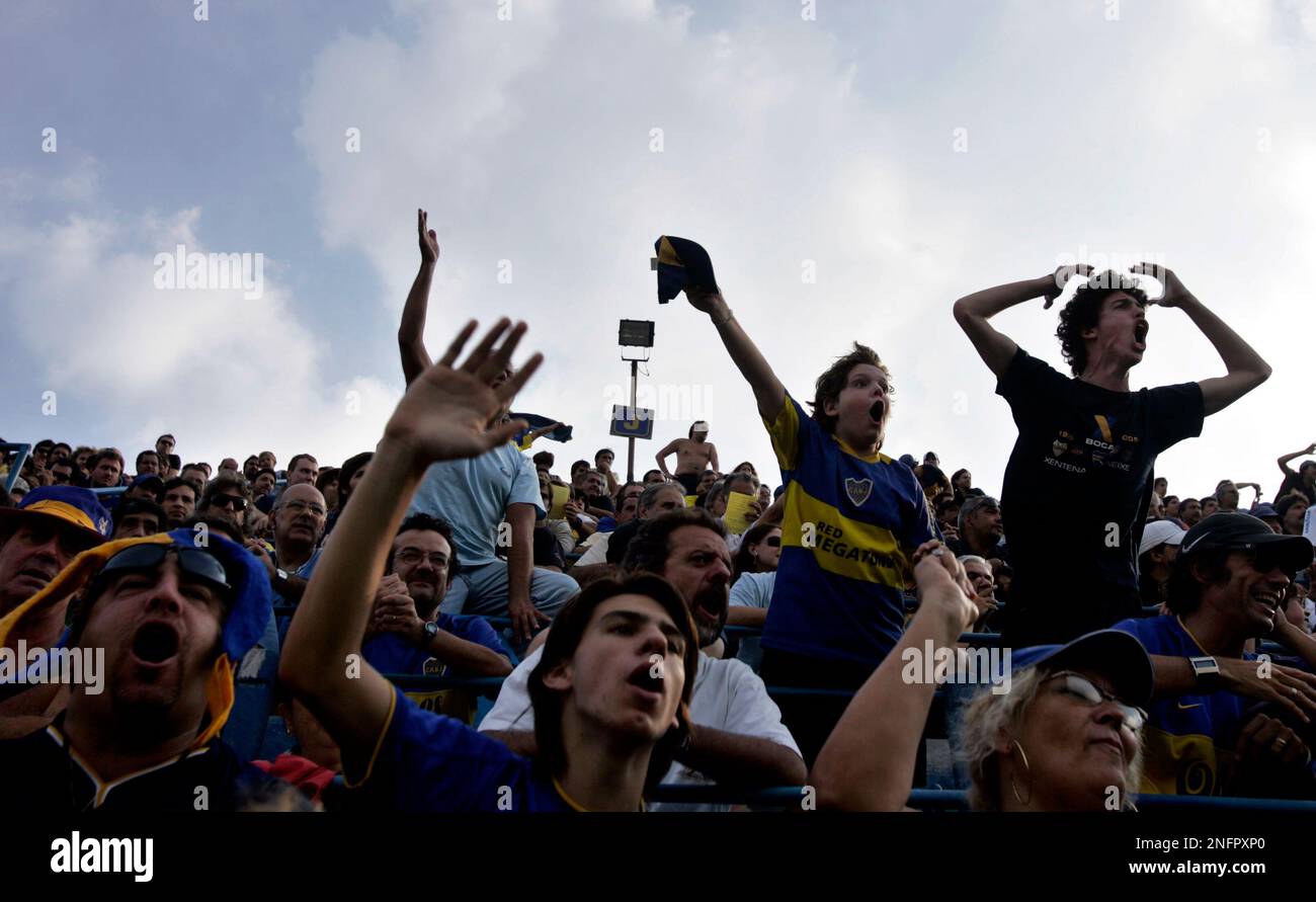 Boca Juniors fans react during a game against Independiente at La ...