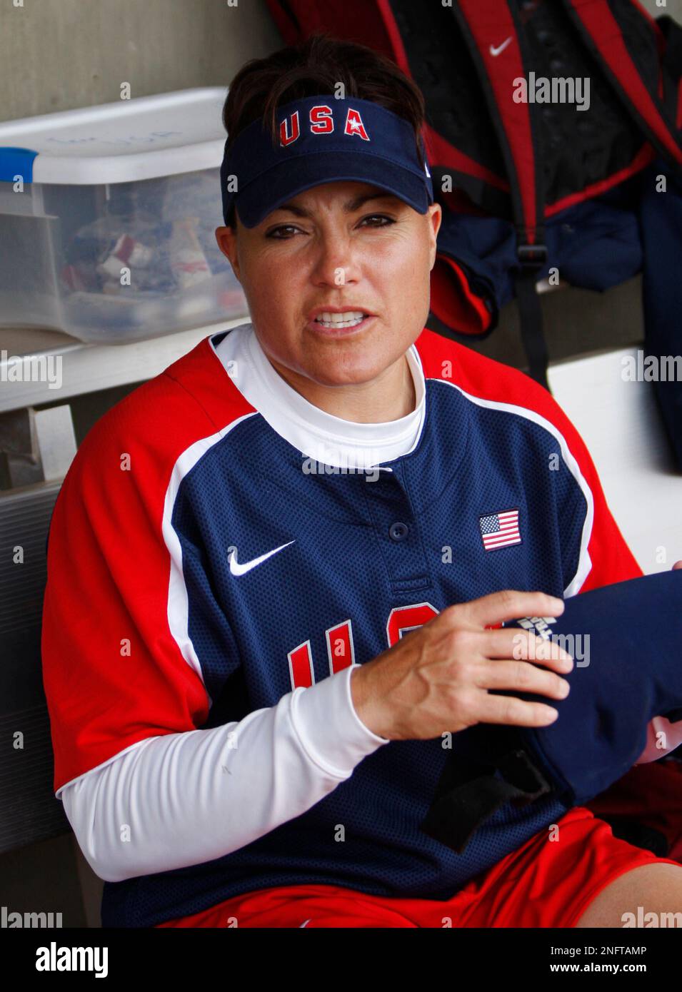 Lisa Fernandez is pictured in the dugout during batting practice prior ...