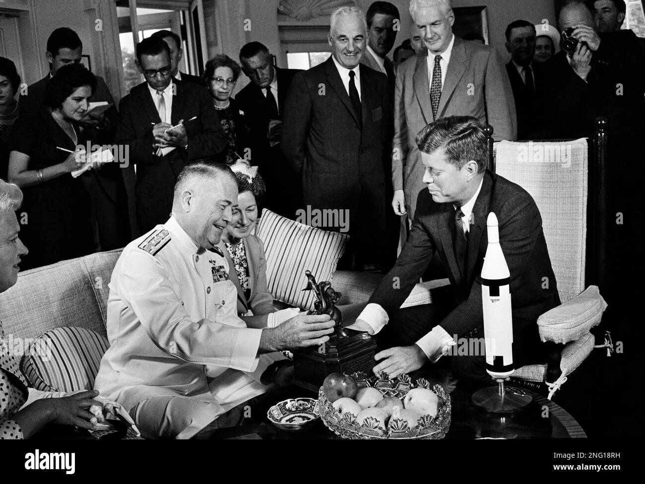 Navy vice admiral William Raborn, Jr., poses with President Kennedy ...