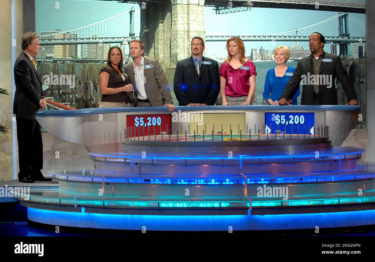 Host Pat Sajak (L), contestant Megan Sippey, actor Neil Patrick Harris ...