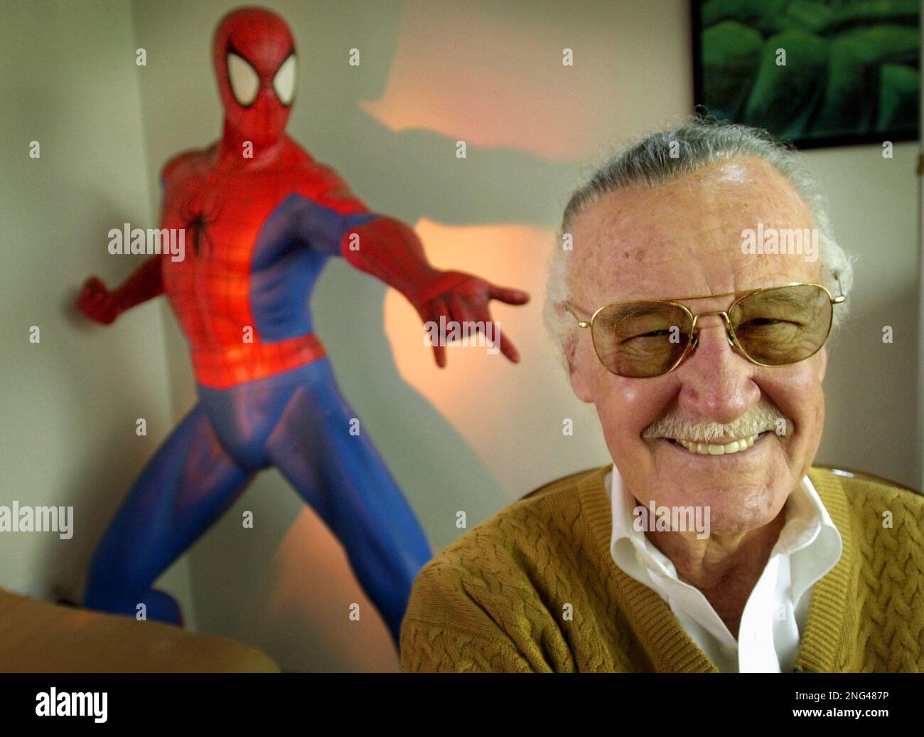 **FILE** Stan Lee smiles in his office, in an April 16, 2002 photo in ...