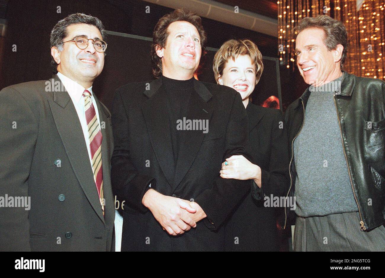 Actress Annette Bening holds on to comedian Garry Shandling as Warren ...