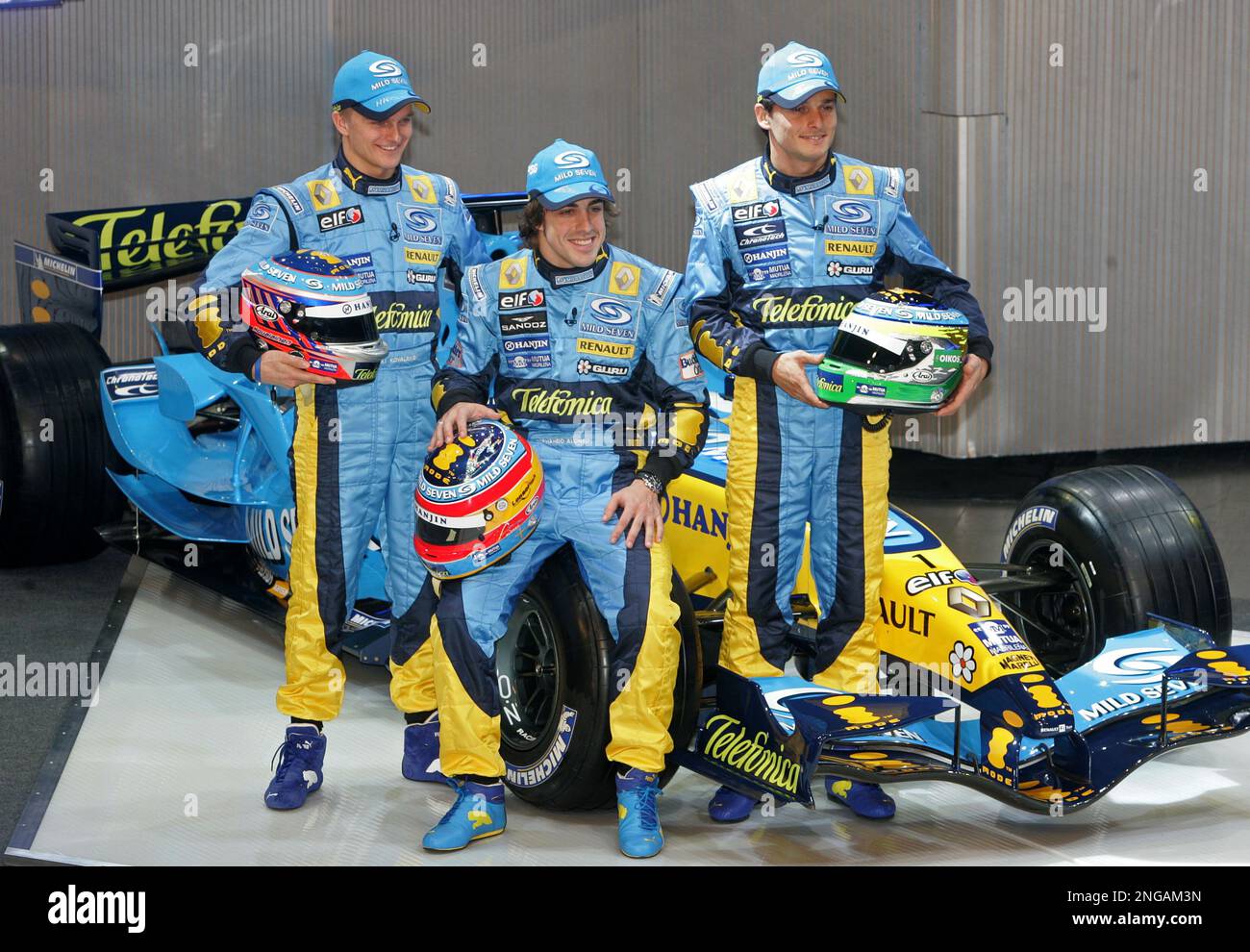 Renault Formula One drivers with World Champion Fernando Alonso of Spain, center, Giancarlo ...