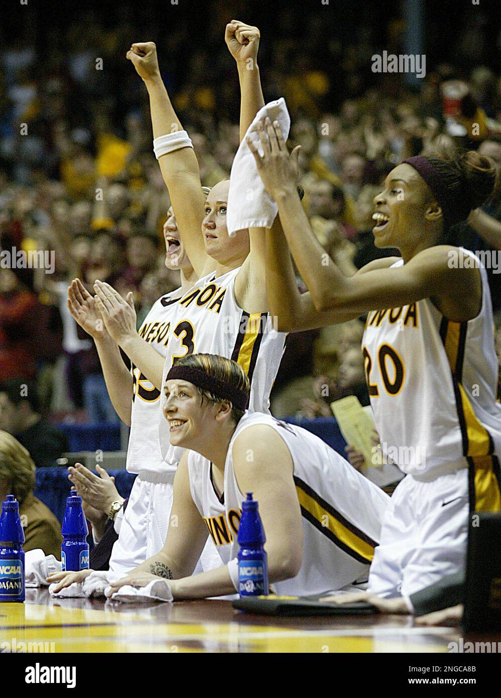 Minnesota players, from left, Liz Podominick, Jamie Broback, Janel ...