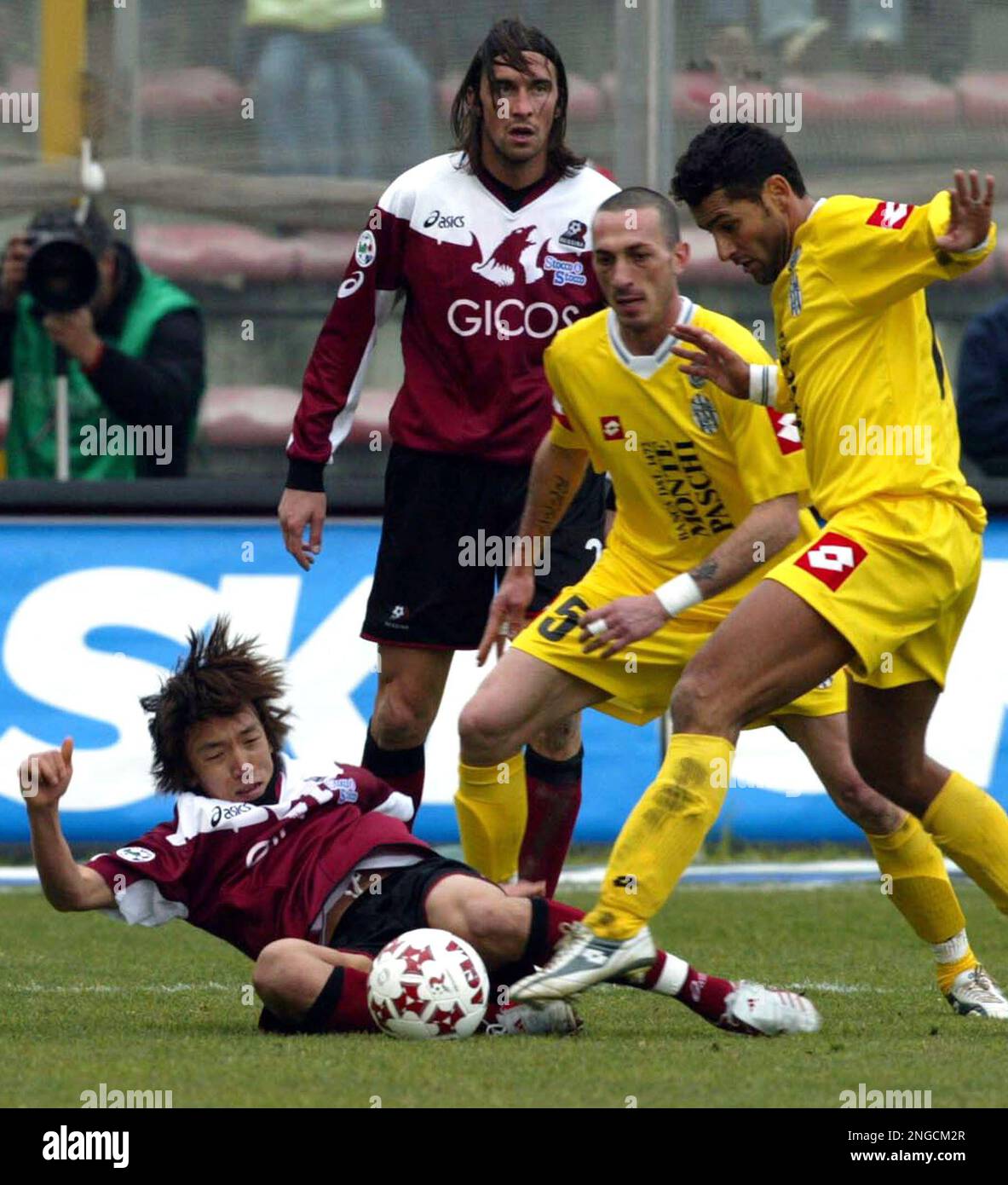 Reggina's Japanese midfielder Shunsuke Nakamura, on the ground, is ...