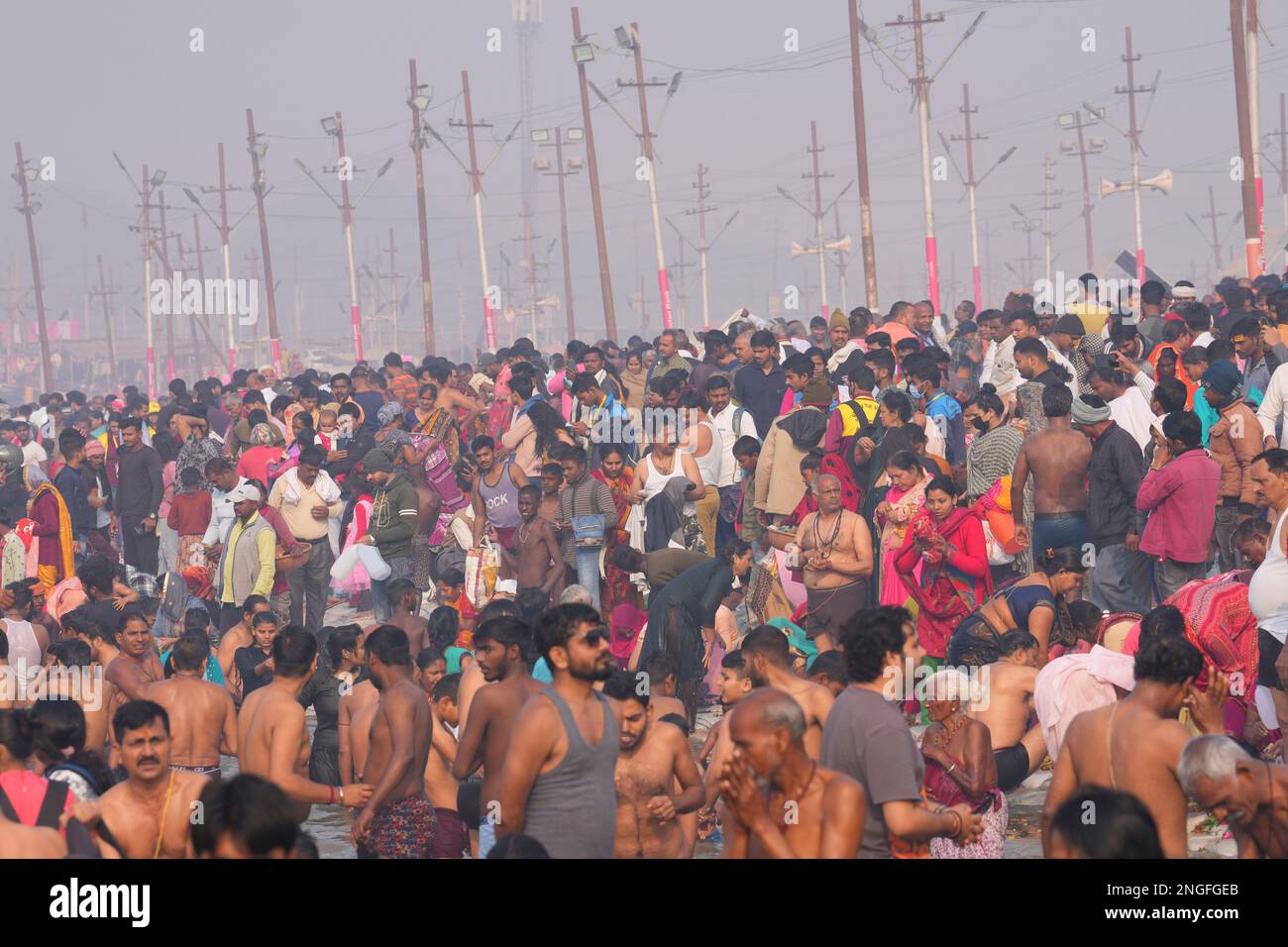 Hindu devotee offer prayers at the Sangam, the meeting point of the ...