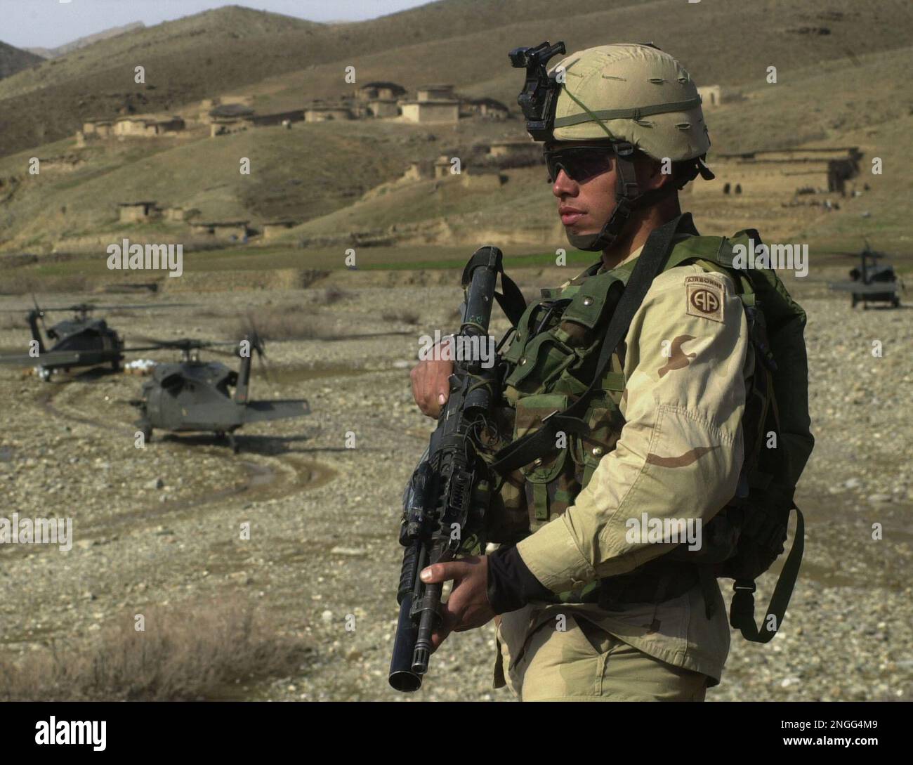 US soldier Pfc. Erick Guevara from Chino, Calif. keeps watch as Black ...