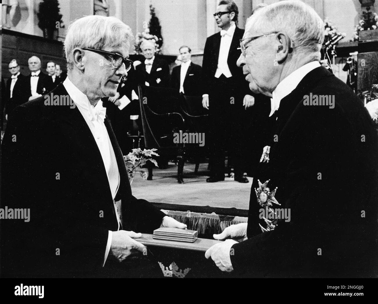 King Gustaf Adolf, right, presents the Nobel Prize for medicine to ...