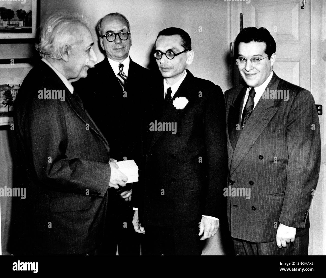 Albert Einstein, left, presents the first Albert Einstein Award for ...