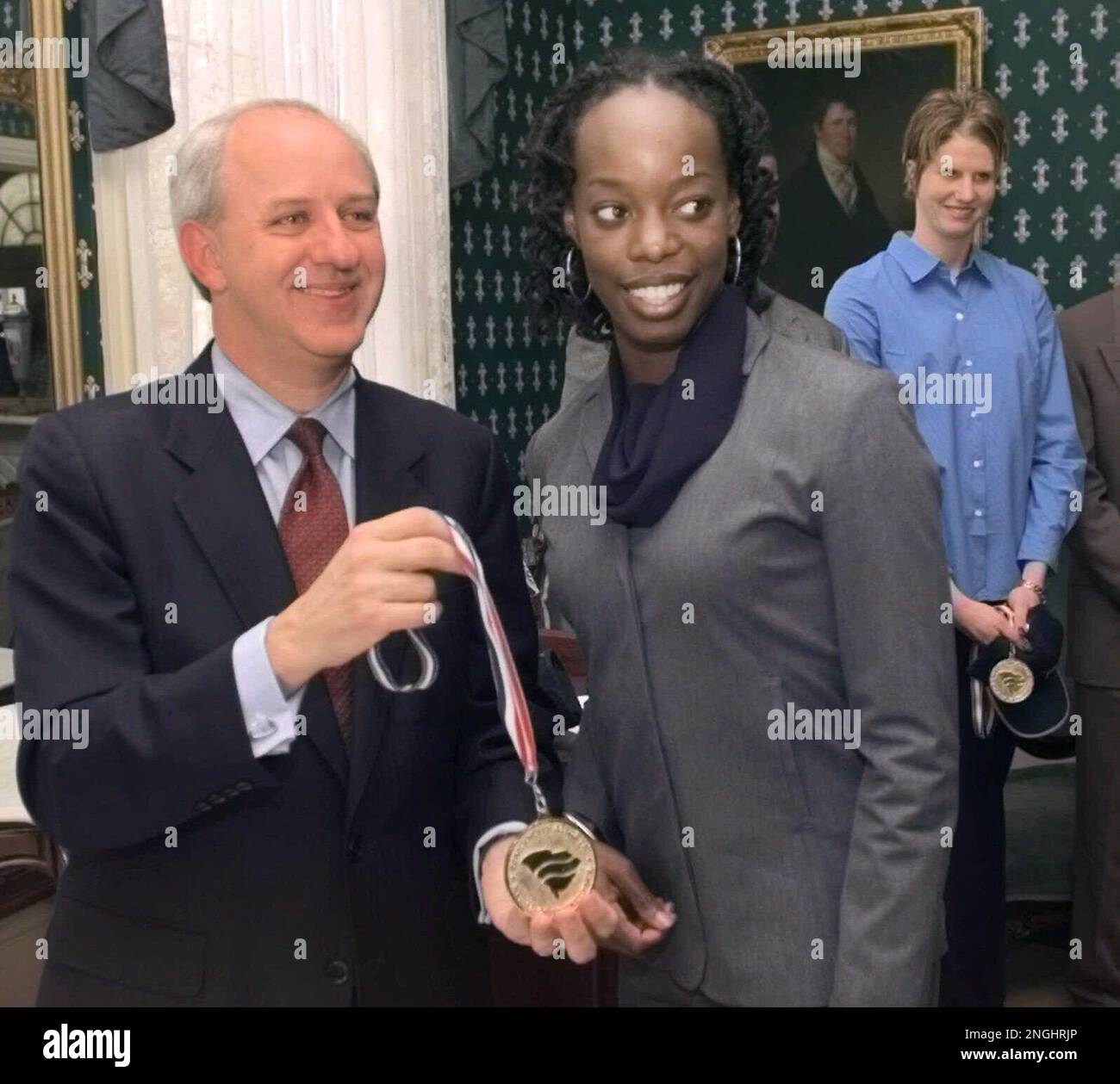 South Carolina Gov. Jim Hodges poses with Monique Hennagan during a ...