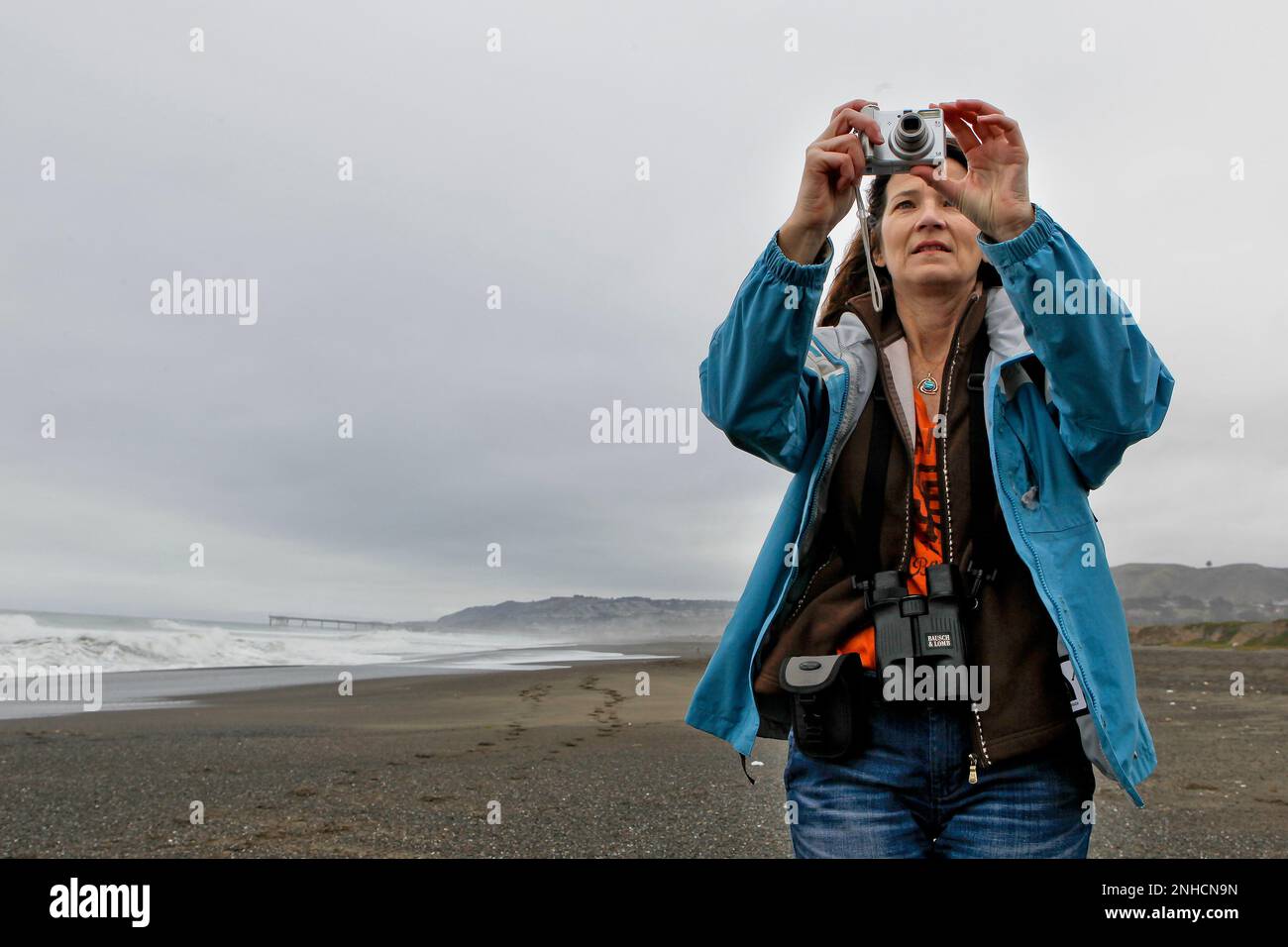 Citizen scientist, Susan McCarthy photographs along Sharp Park Beach in ...
