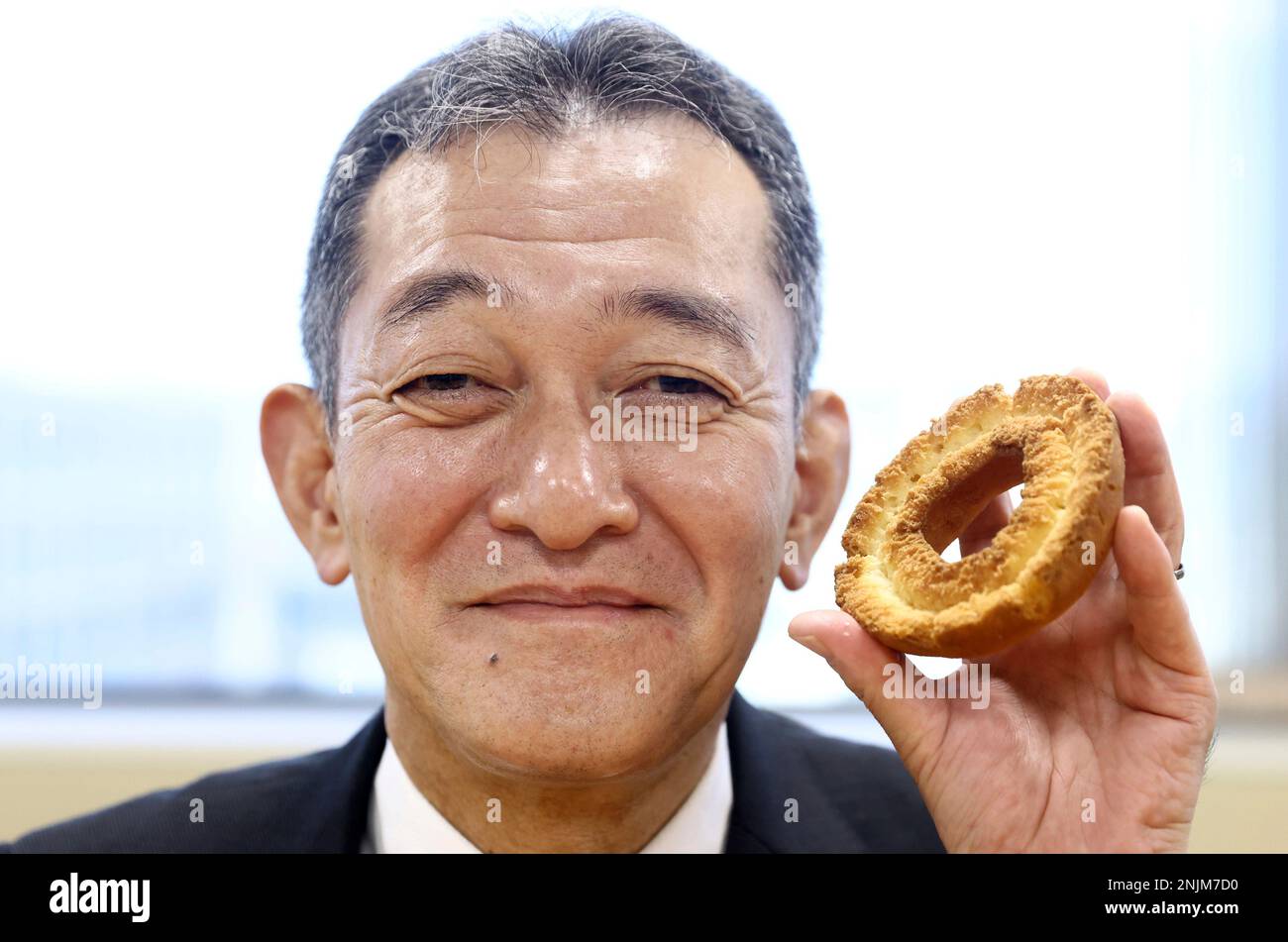 DUSKIN CO.'s president Hiroyuki Okubo poses for a photo in Suita City ...