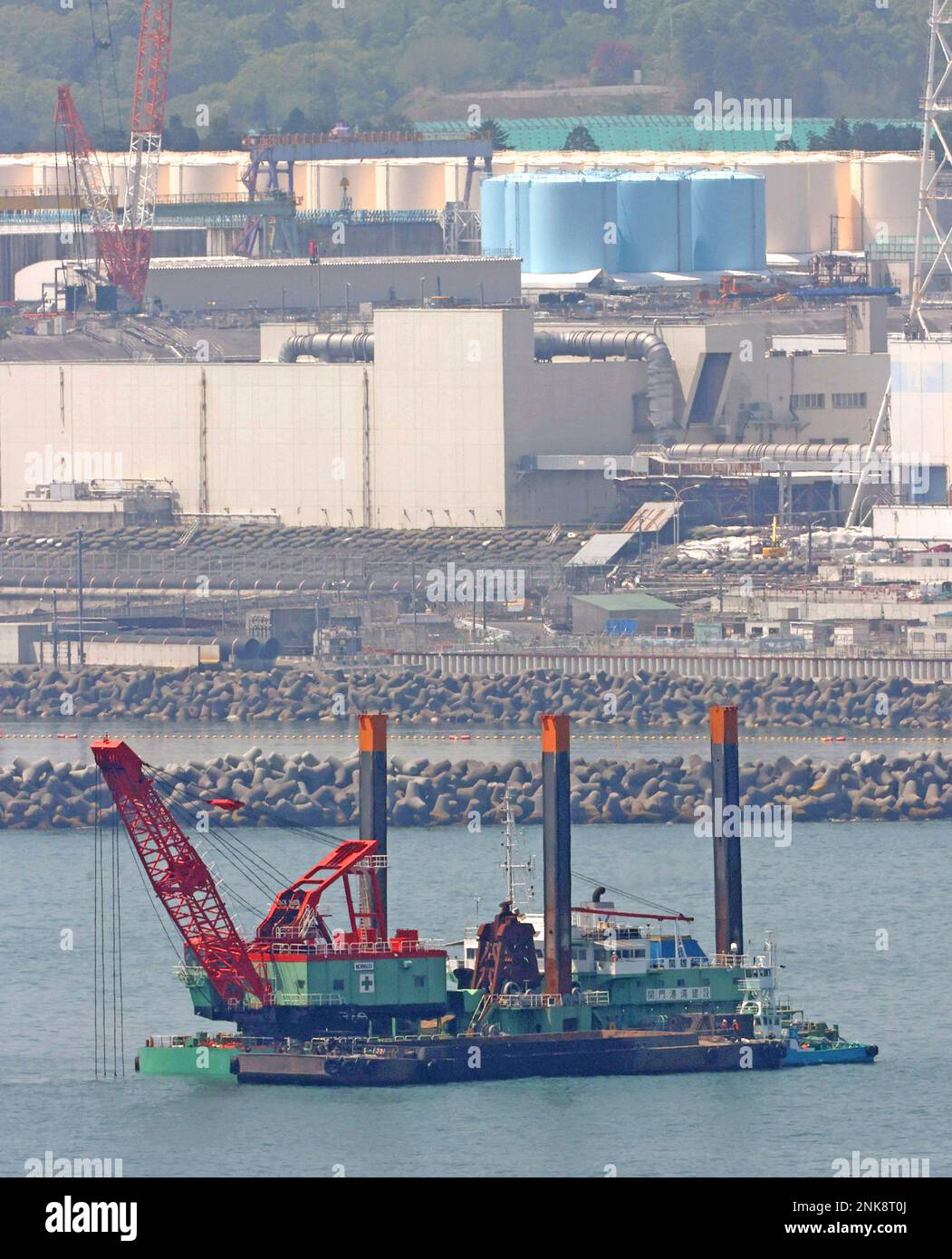 An aerial photo shows a drilling vessel off the crippled Fukushima No ...