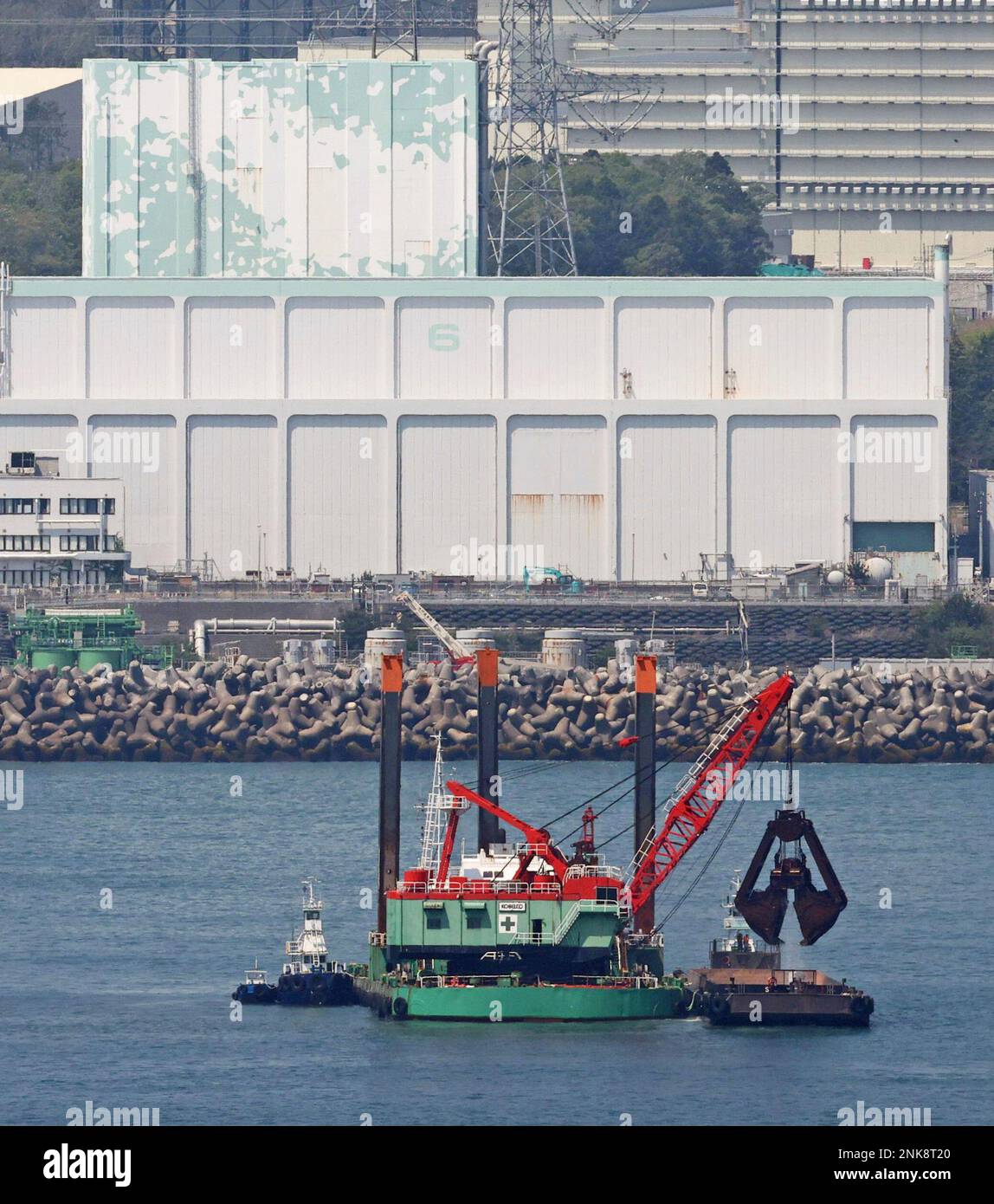 An aerial photo shows a drilling vessel off the crippled Fukushima No ...