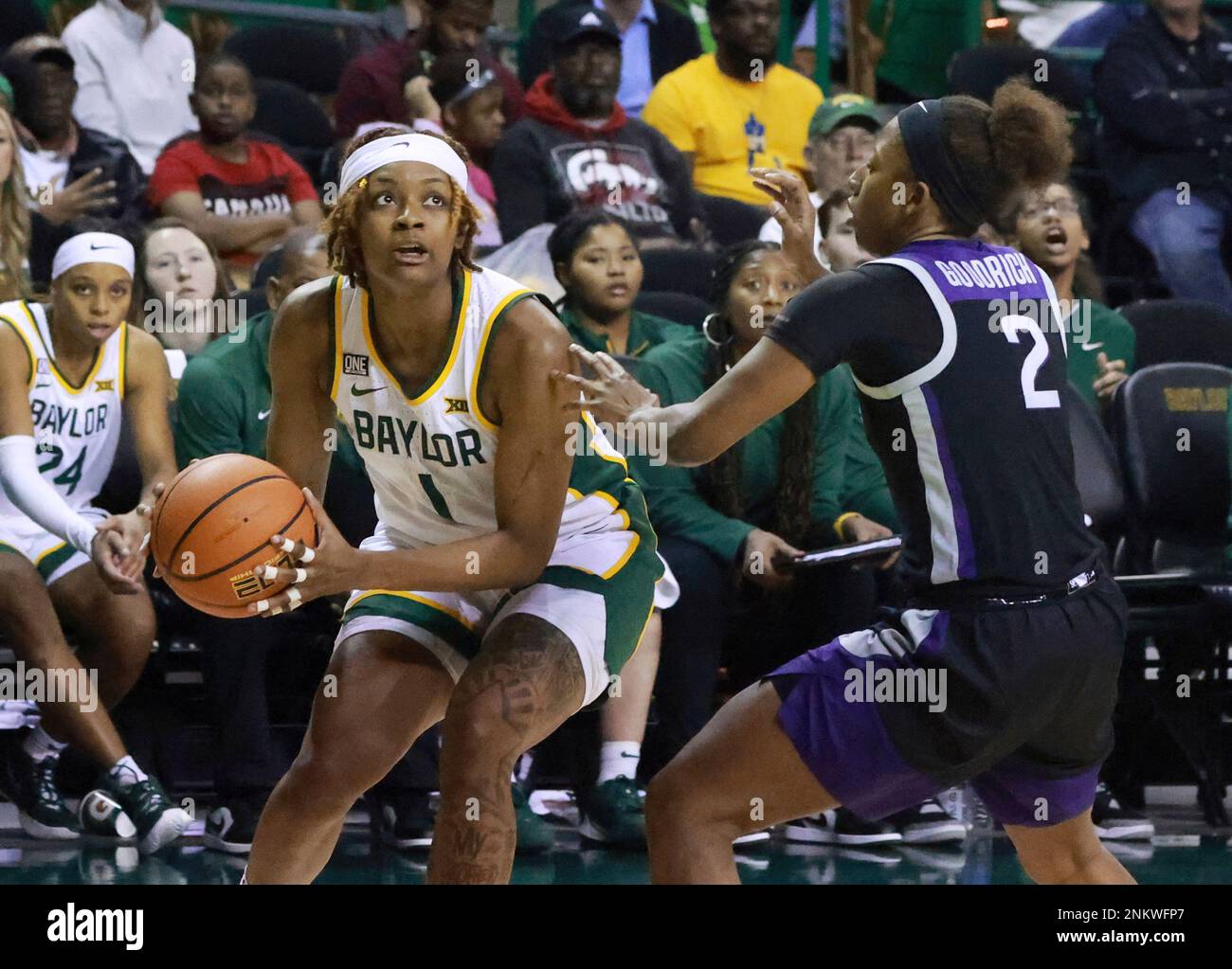 Baylor forward NaLyssa Smith, left, looks toward the basket while ...