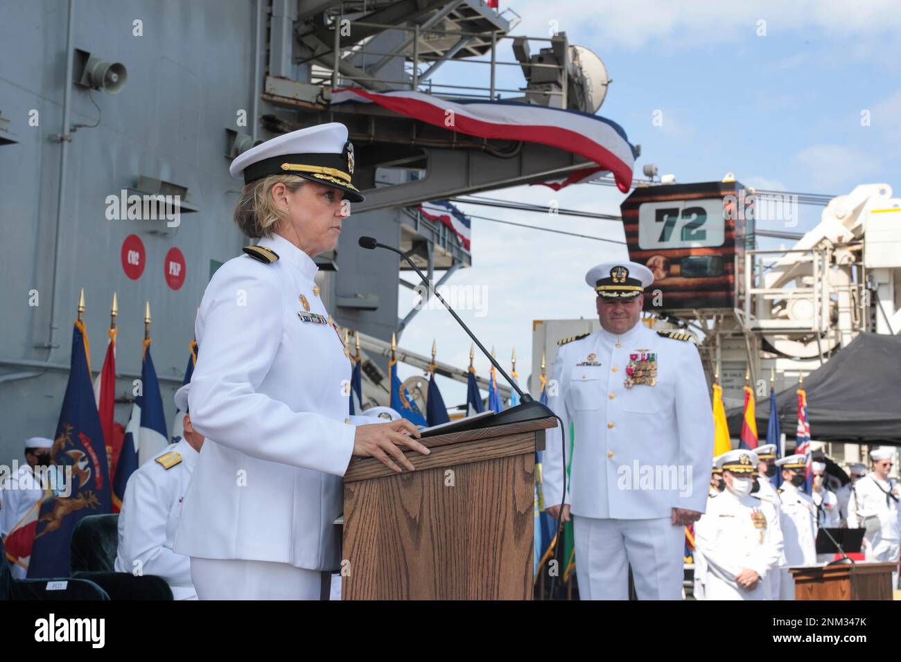 In this photo released by the U.S. Navy, Capt. Amy Bauernschmidt, left ...