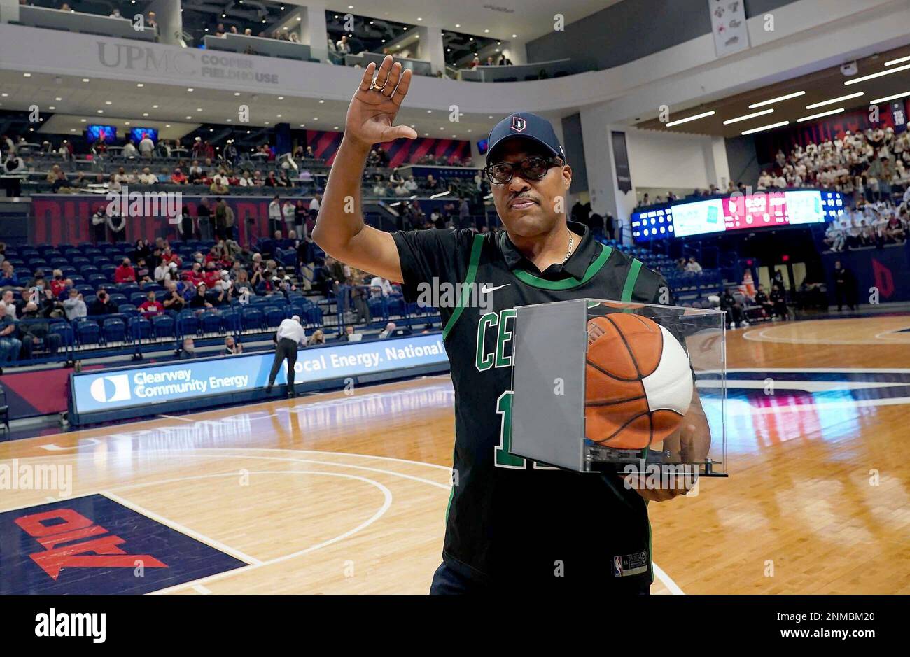 Chuck Cooper III acknowledges the crowd as Duquesne University ...