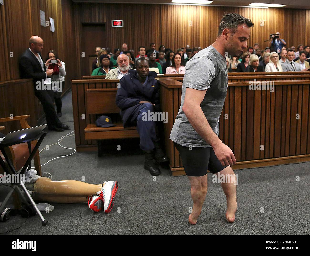FILE - Olympic runner Oscar Pistorius' prosthetics lay on the floor as ...